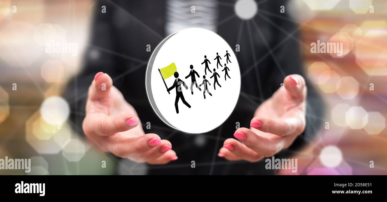 Leadership concept above the hands of a woman in background Stock Photo ...