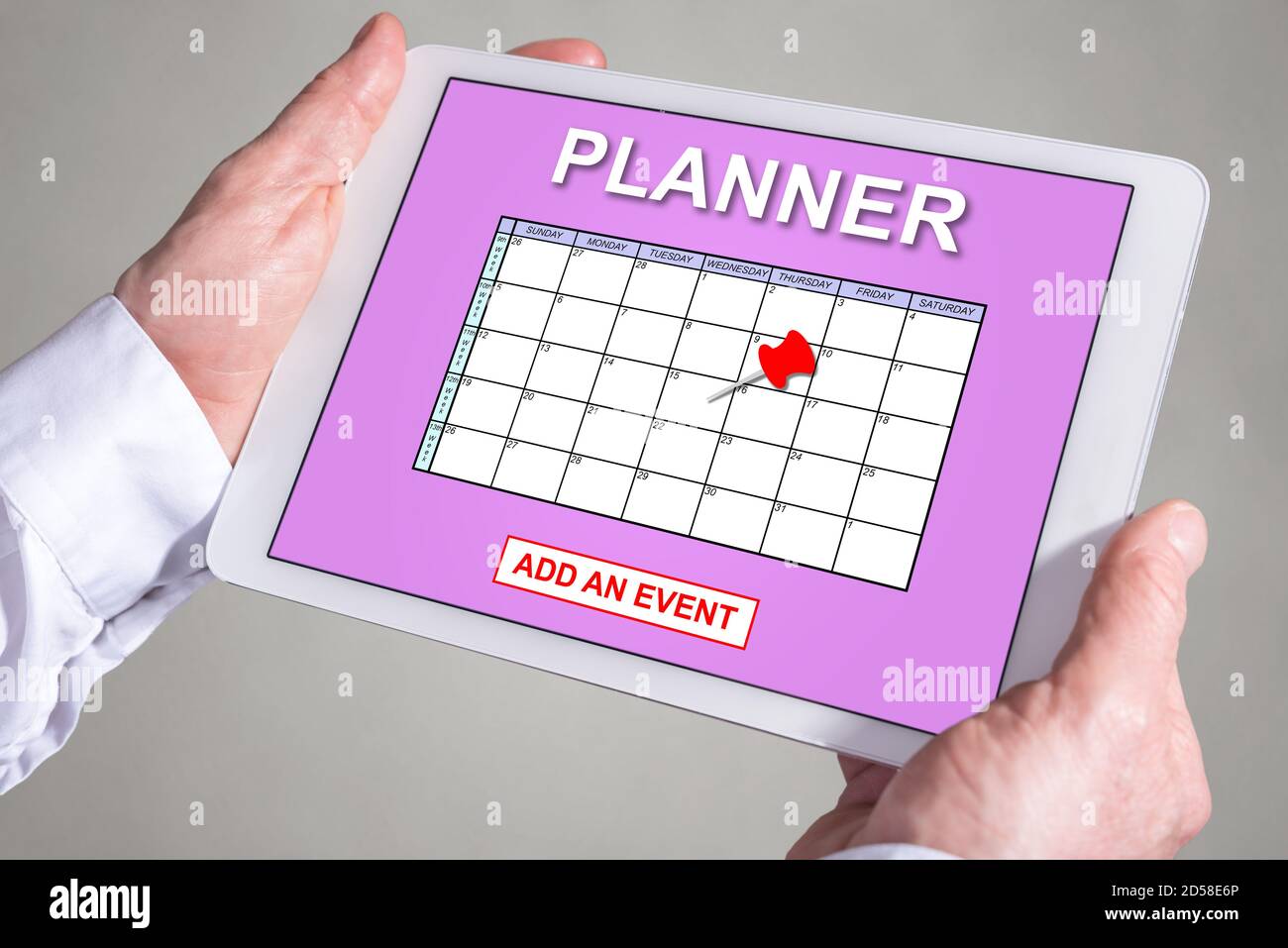 Tablet screen displaying an event adding on planner concept Stock Photo ...
