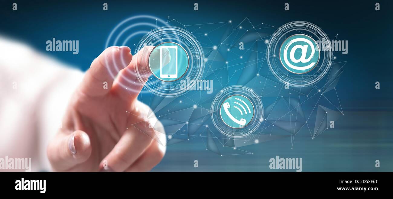 Woman touching a contact concept on a touch screen with her finger ...