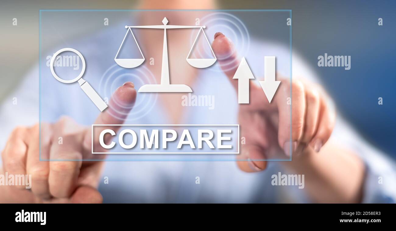 Woman touching a compare concept on a touch screen with her fingers ...