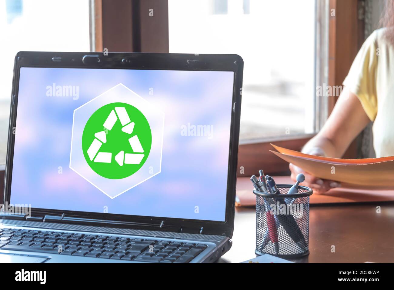 Laptop screen displaying a recycling concept Stock Photo - Alamy