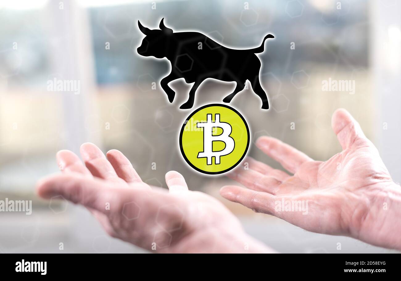Bitcoin bullish trend concept above the hands of a man Stock Photo - Alamy