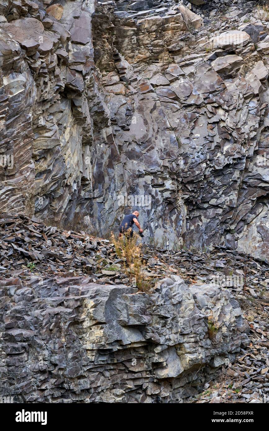 Various rock formation in geological layers in an abandoned quarry ...