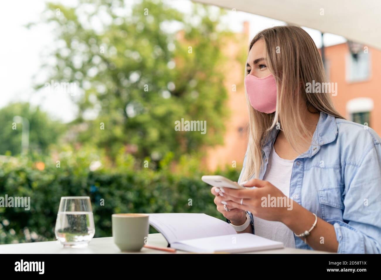Person using mask hi-res stock photography and images - Alamy