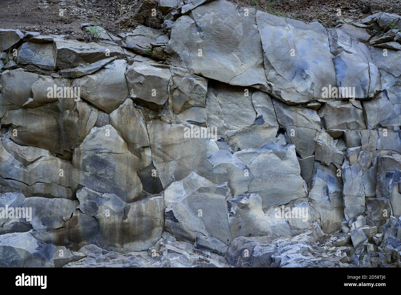 Various rock formation in geological layers in an abandoned quarry ...