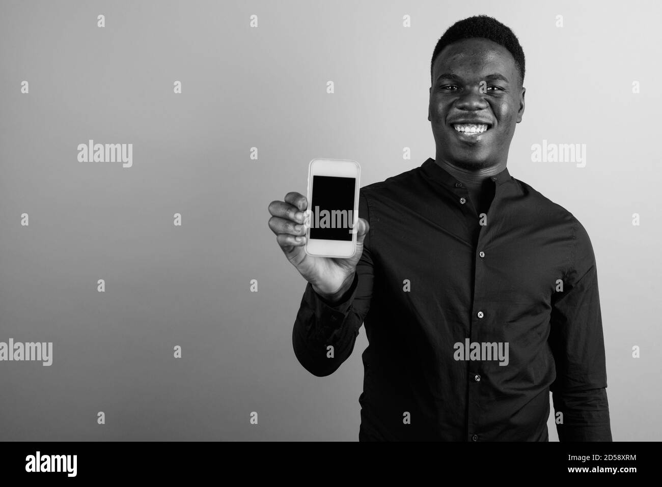 Businessman mobile phone copy space Black and White Stock Photos ...