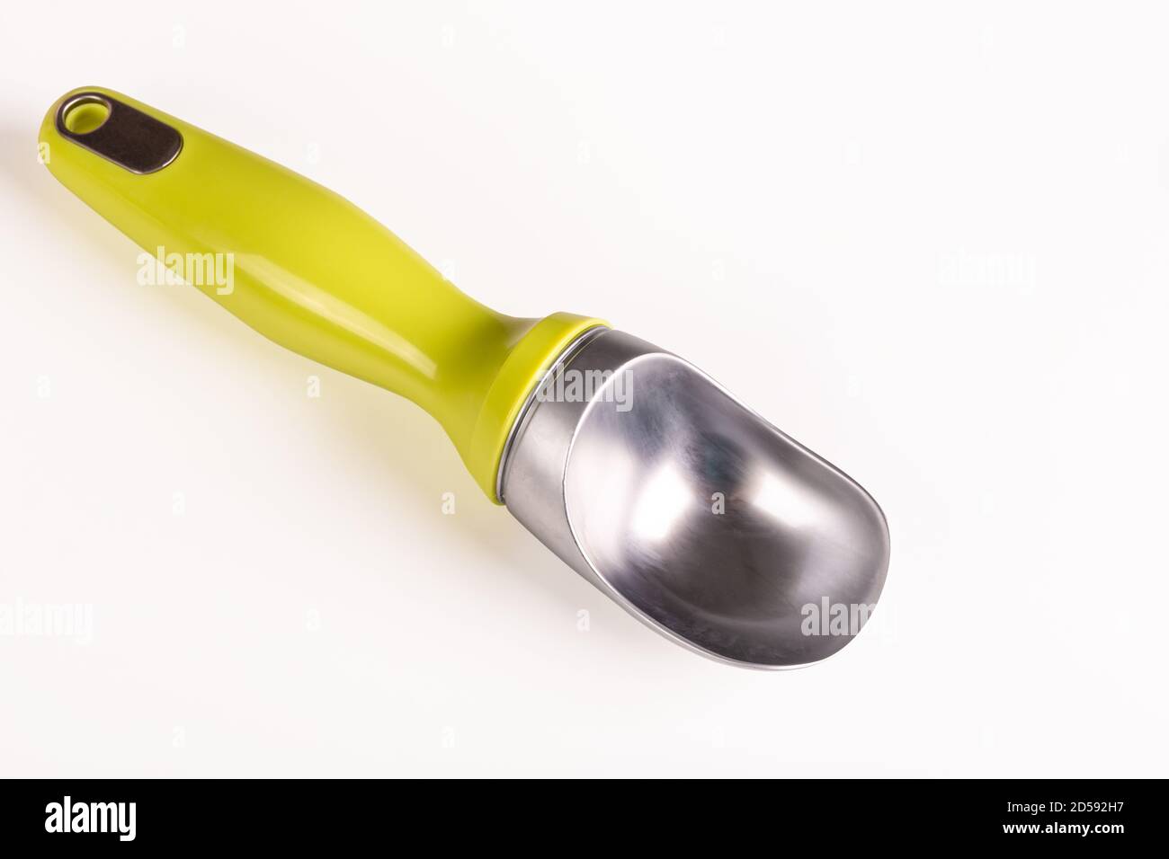 Single piece ice cream scoop with bright green handle Stock Photo - Alamy