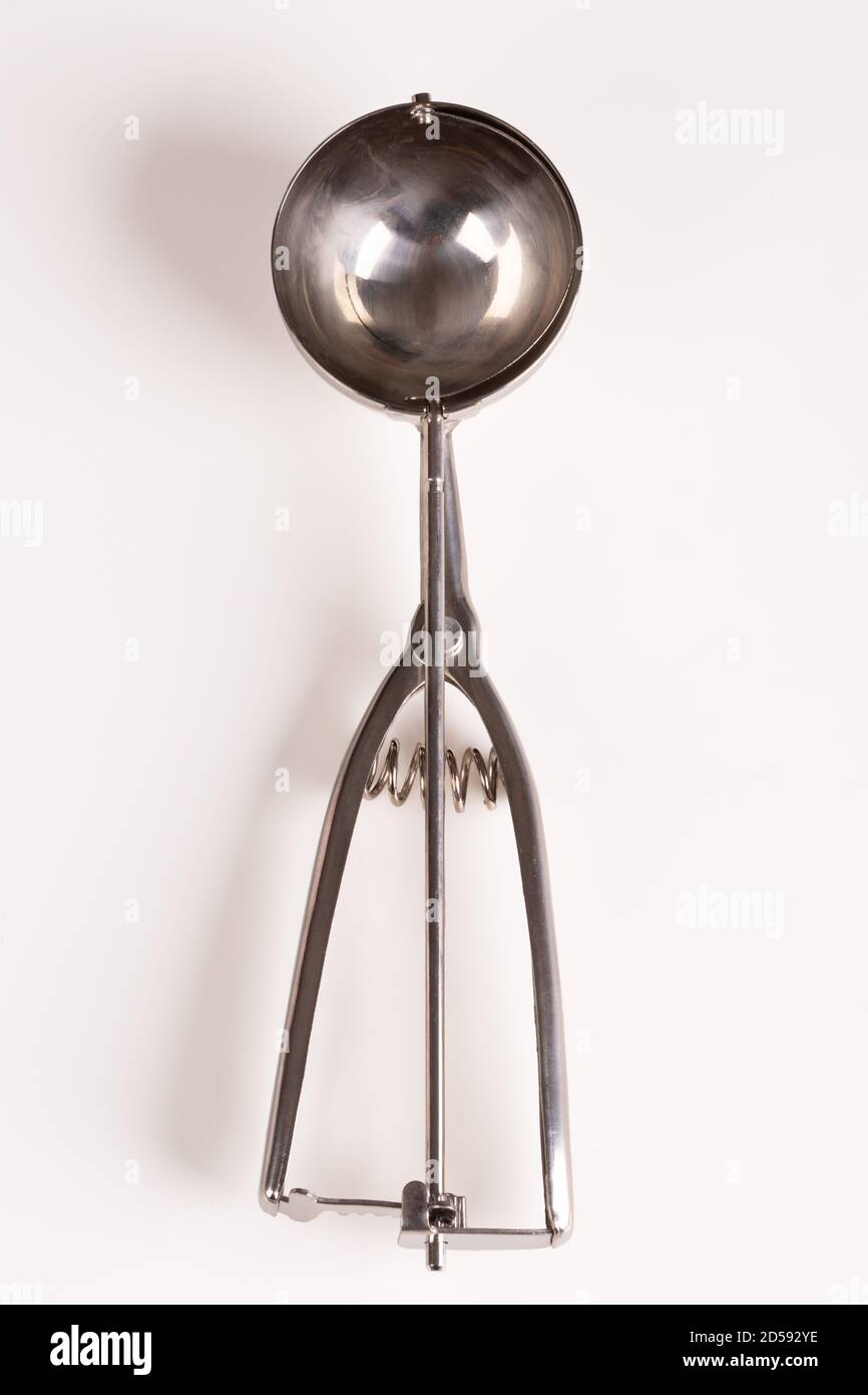 Mechanical ice cream scoop with a crank handle, which rotates a bar ...