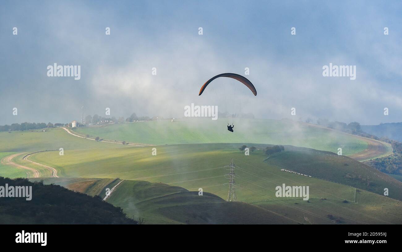 Paragliding flight above foggy autumn hi-res stock photography and ...