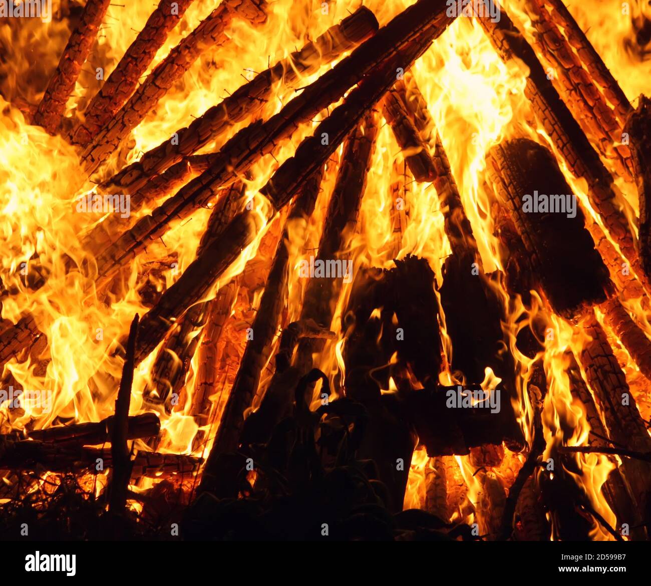 Wooden sticks burn in campfire hi-res stock photography and images - Alamy