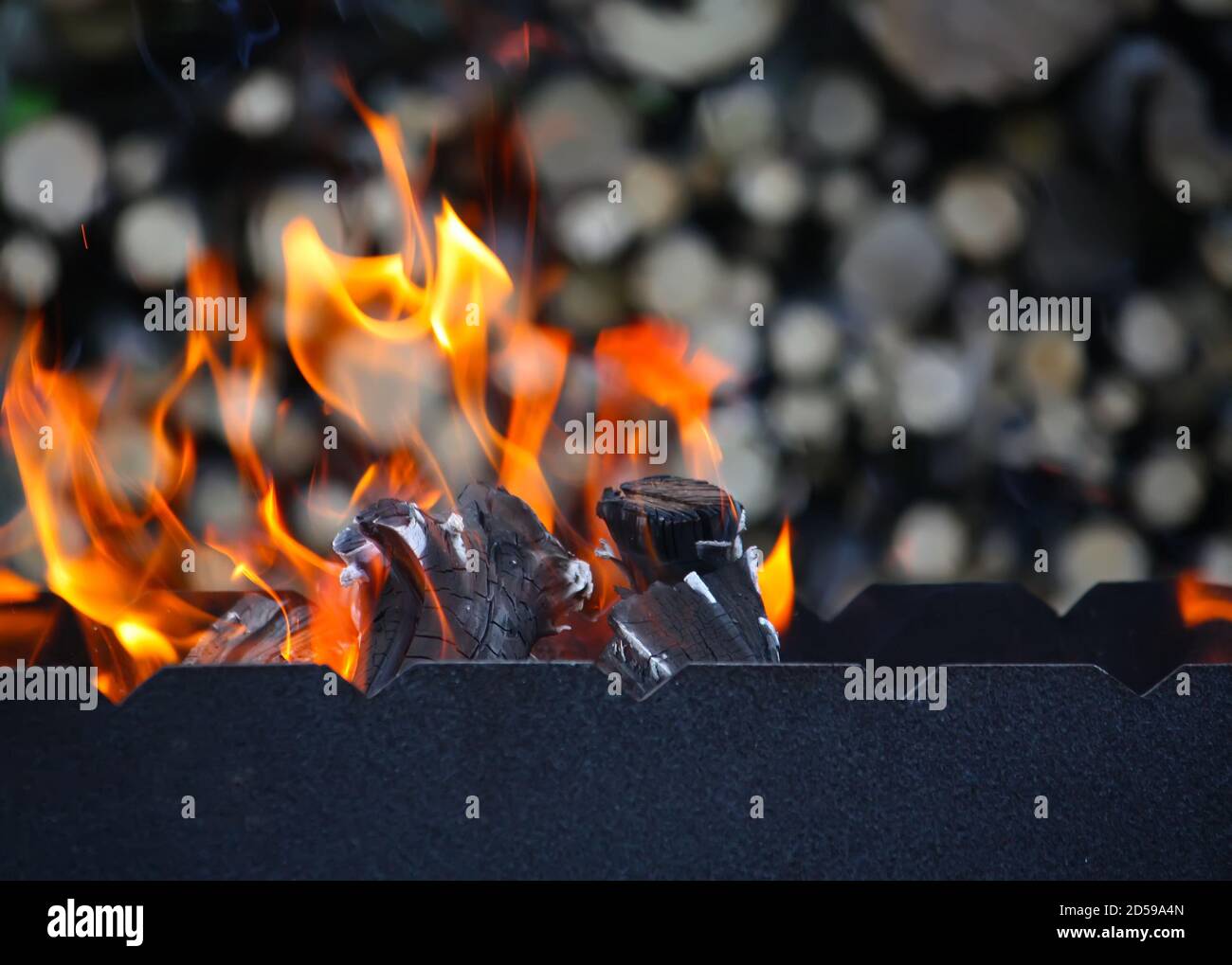 Bright fire flame outdoors over the brazier Stock Photo - Alamy