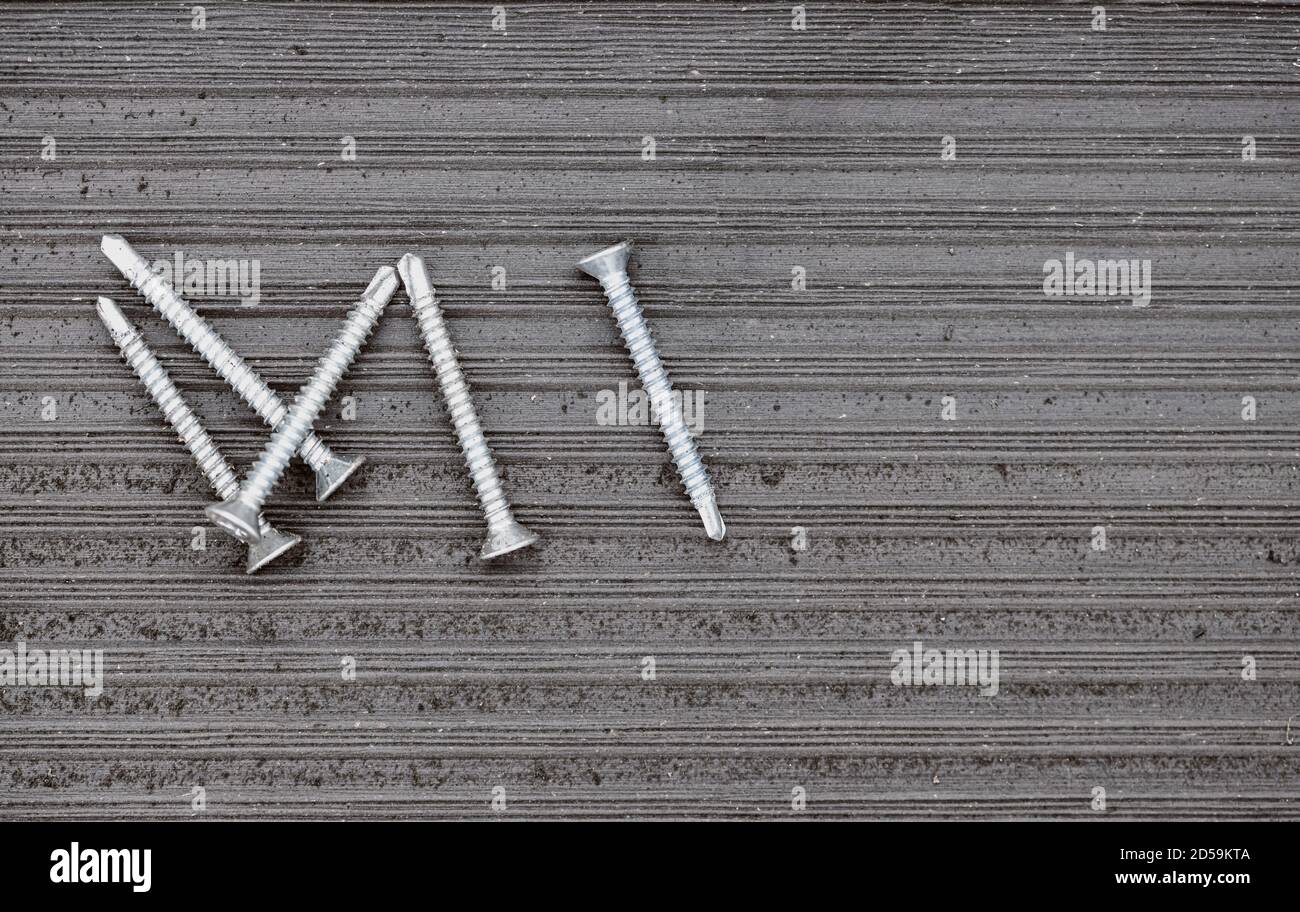 Close up of composite decking with screws Stock Photo - Alamy