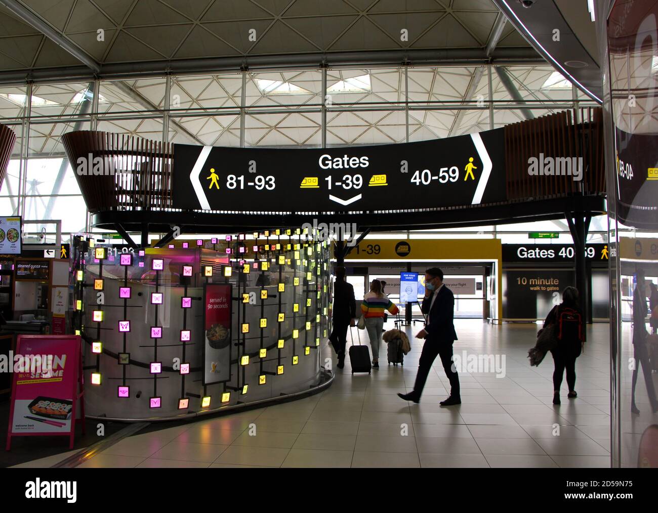 Signs to gates on an October 2020 morning during the pandemic at ...