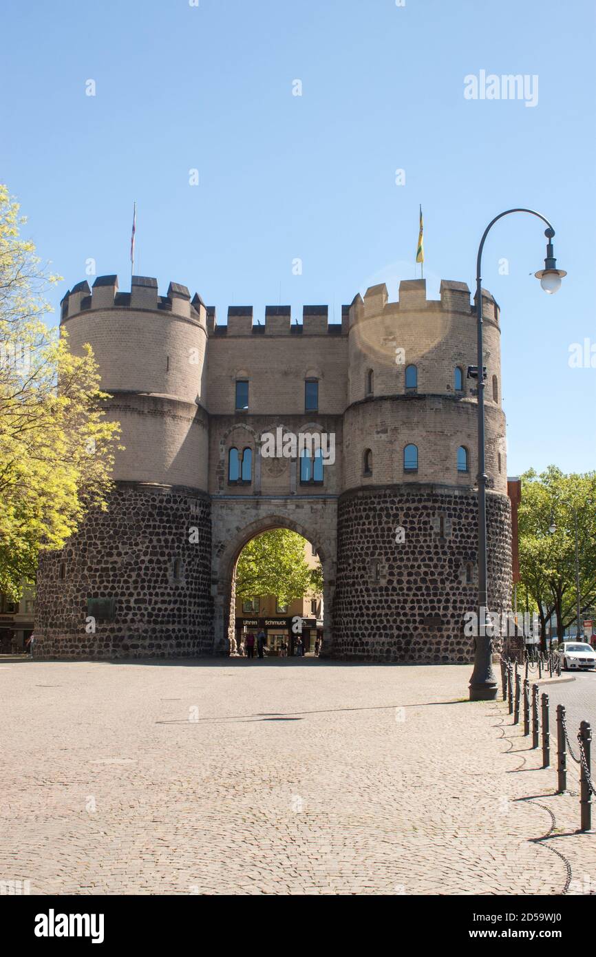 Medieval city gate with two round towers, part of the old city defense ...