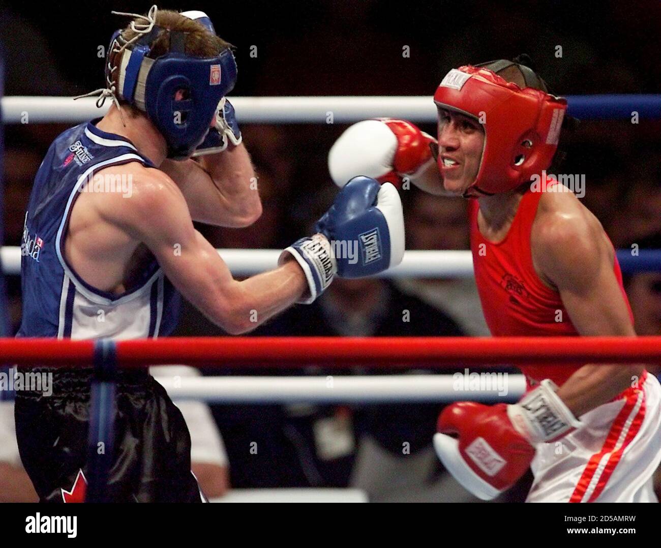 Mexico's Liborio Romero (R) fights against Canada's Domenic Filane (L ...