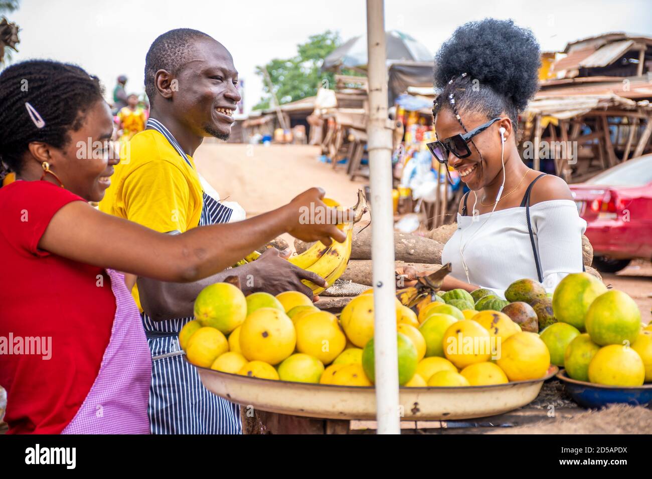 Scene of African people trading in a local market Stock Photo - Alamy