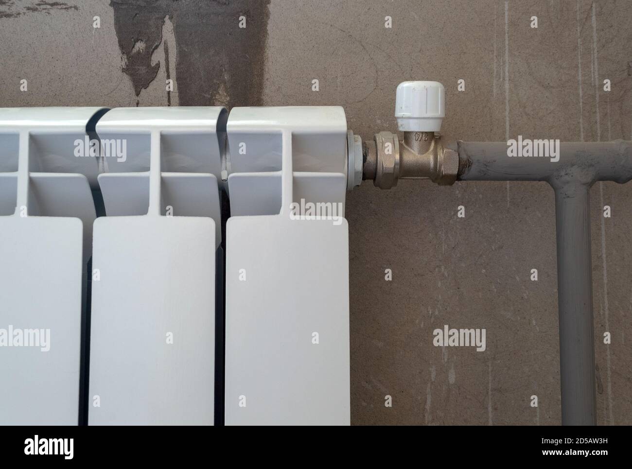 Thermostat of regulator on heating system in modern radiator Stock ...
