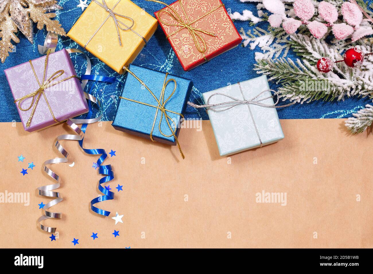 Christmas gifts in small boxes. Space for text Stock Photo - Alamy