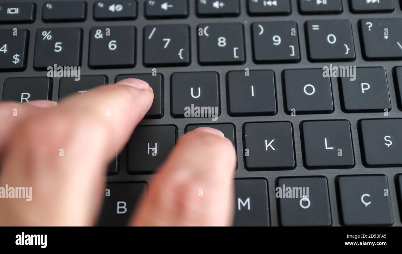 hand on keyboard, one of the most done activities in our age Stock ...