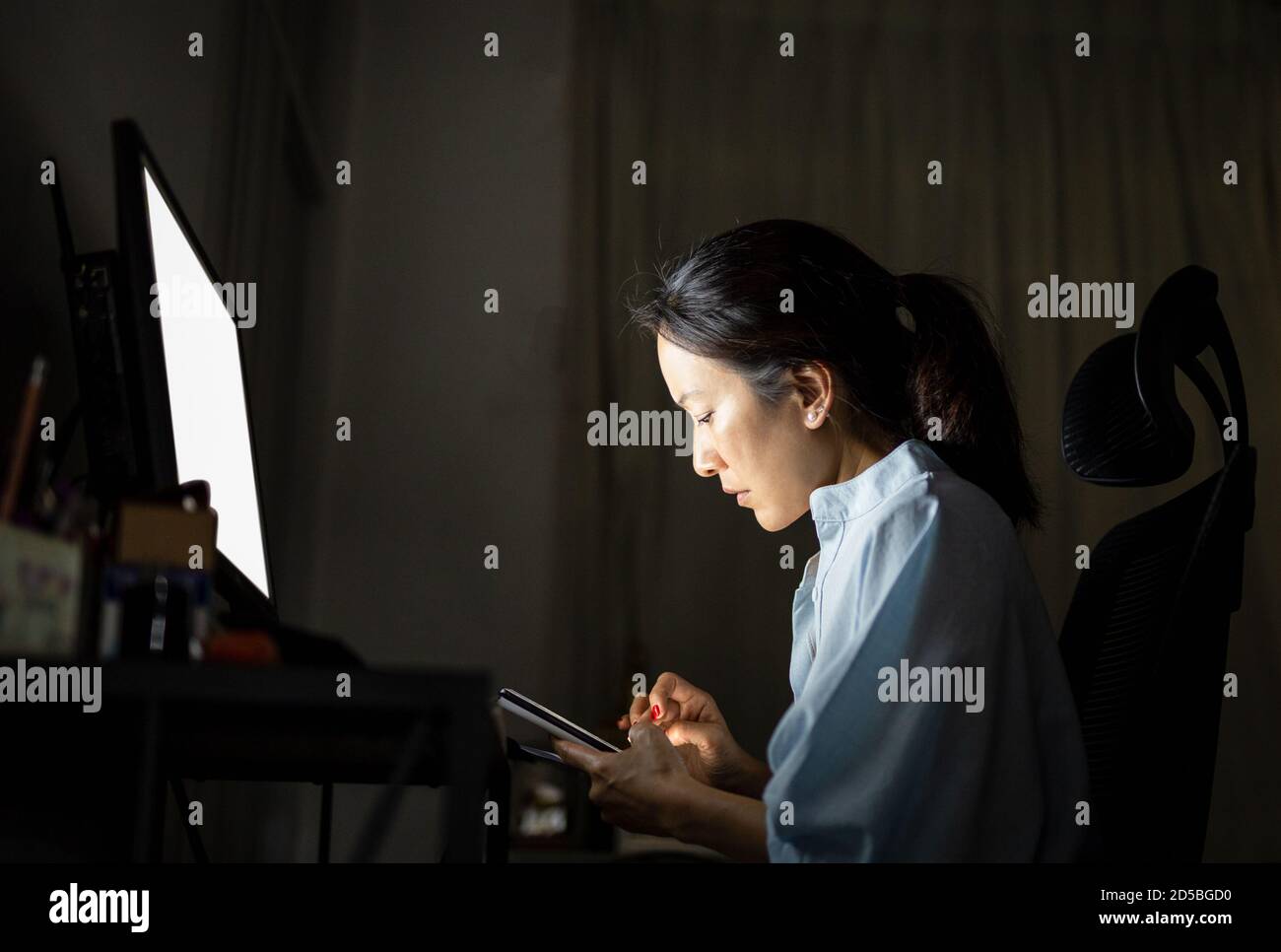 Busy businesswoman using desktop computer hi-res stock photography and ...