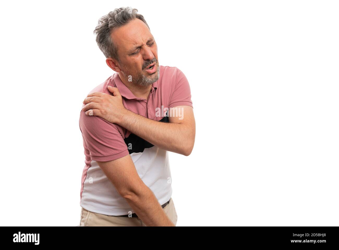 Adult male model wearing colourful summer tshirt touching painful ...