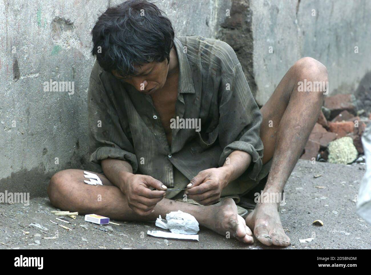 Drug addicts smoke heroin in hi-res stock photography and images - Alamy
