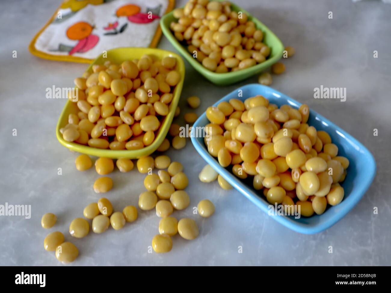 salty lupins (Termiye) cooking on a marble background. traditional ...