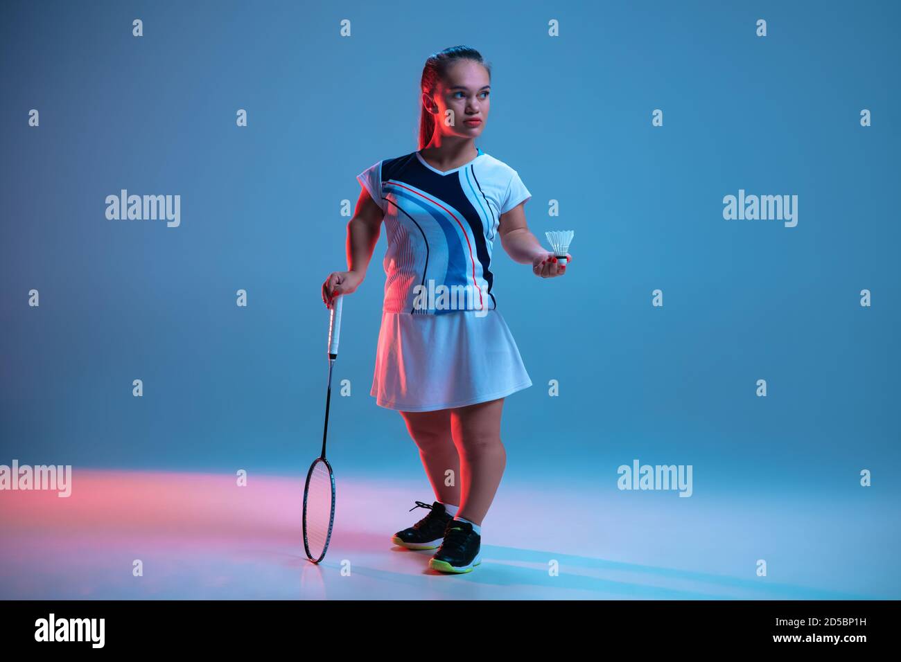 Leader Beautiful Dwarf Woman Practicing In Badminton Isolated On Blue