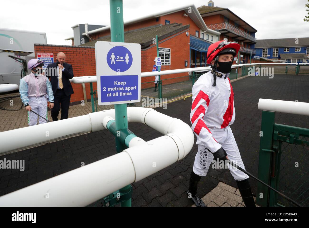 Jockey duran fentiman passes social distancing signage walking hi-res ...