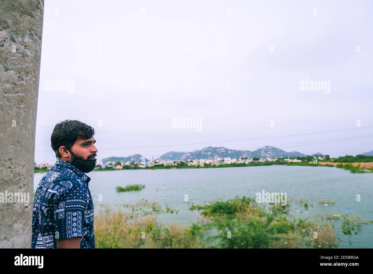 Pileru, Andhra Pradesh, India - October 03,2020 : A person looking at ...