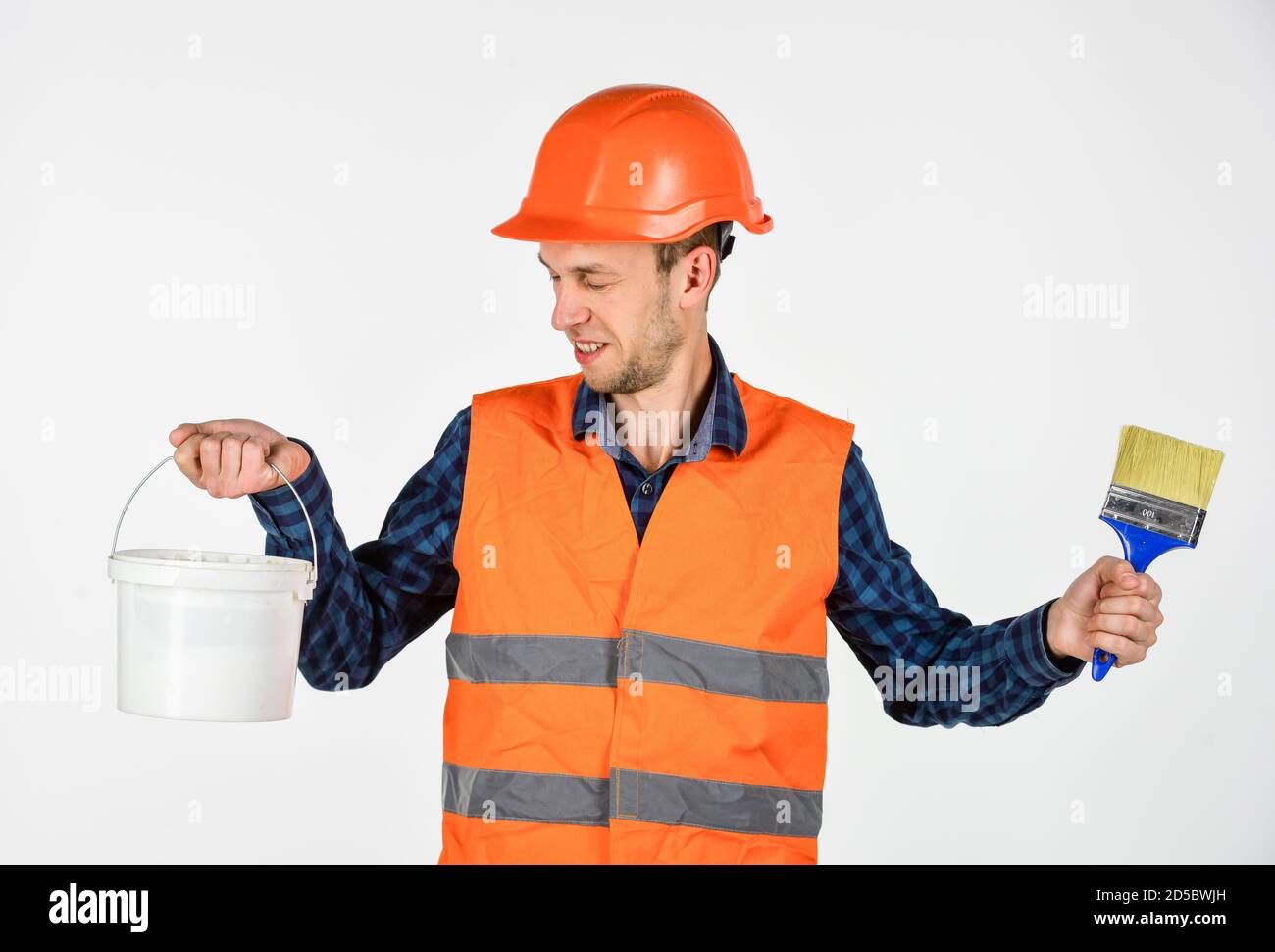 real painter worker in helmet. carpenter ready to work. building tool ...