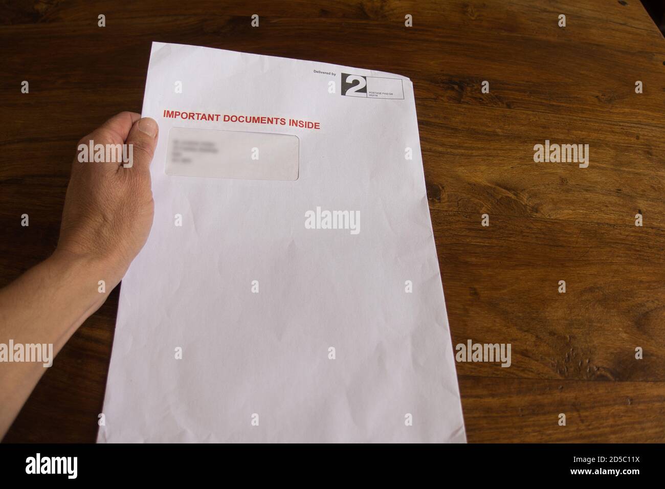 A second class A4 envelope marked with red words - Important Documents ...