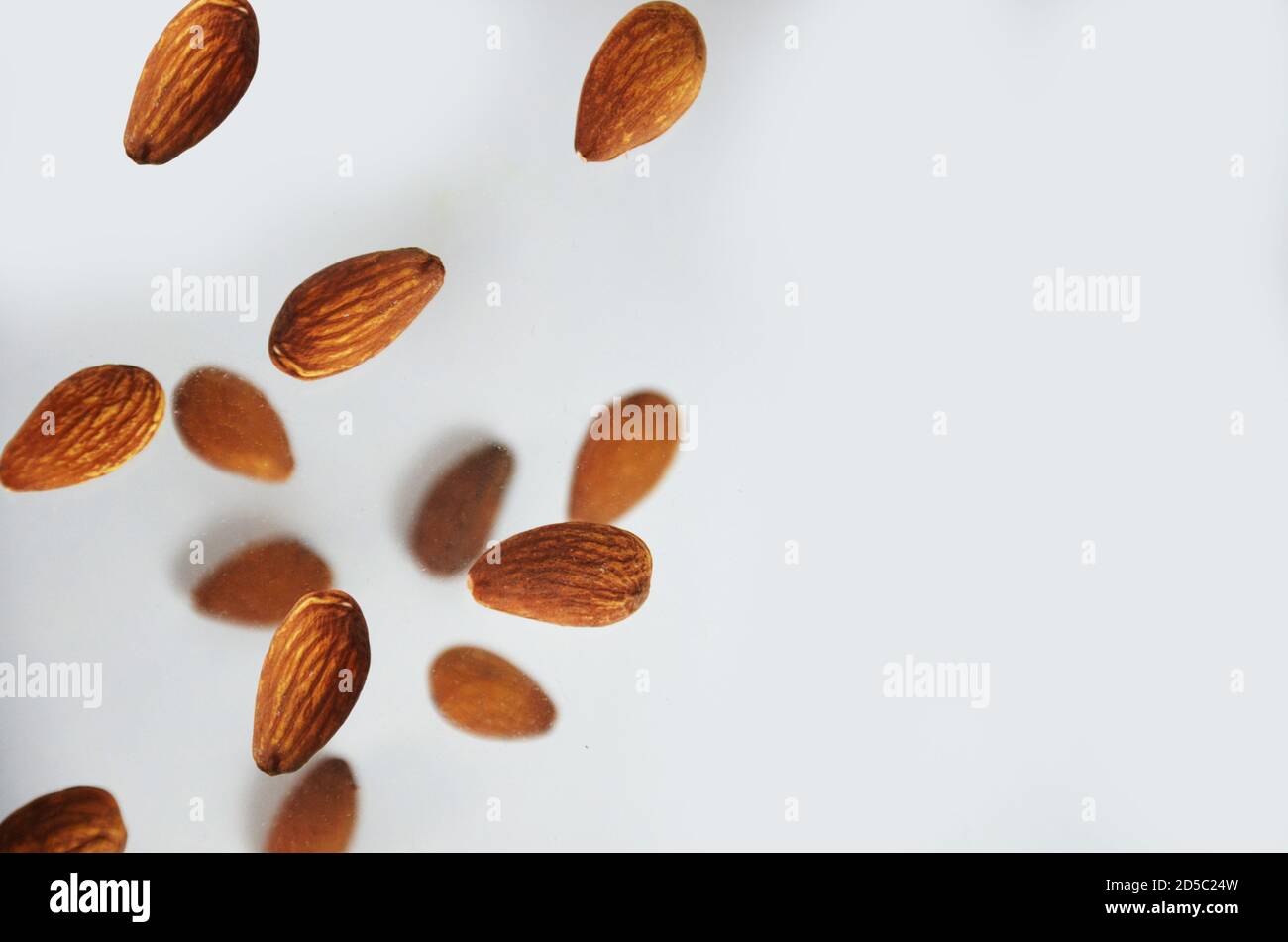 almonds fly on a white background. Composition of nuts flat lay almonds ...