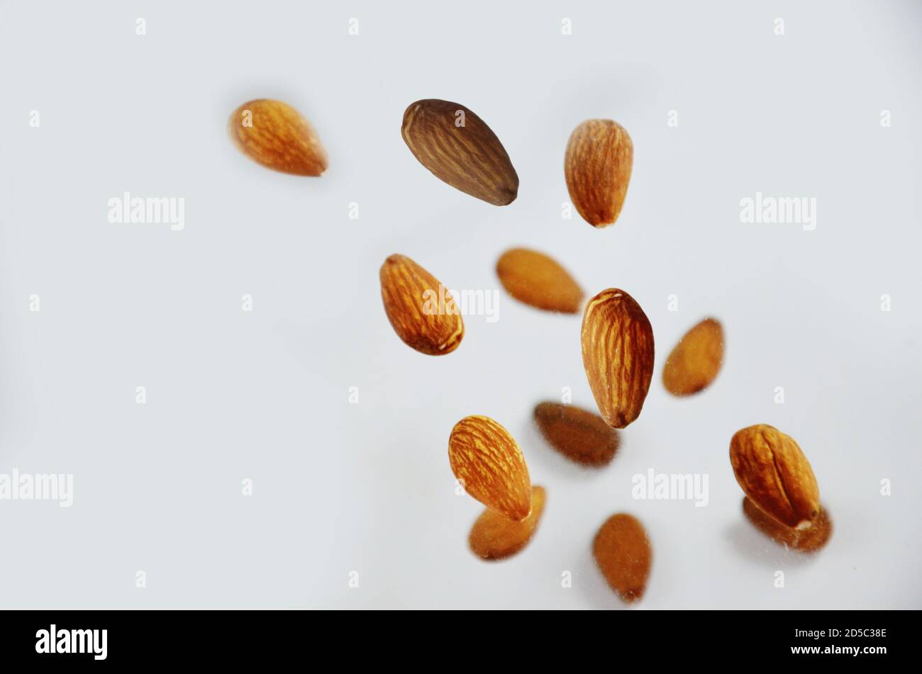 almonds fly on a white background. Composition of nuts flat lay almonds ...