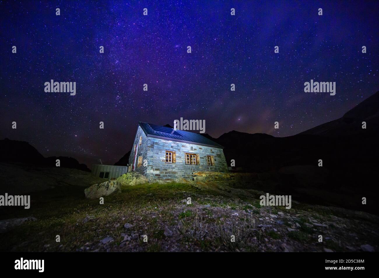 Mountain hut at night Stock Photo - Alamy