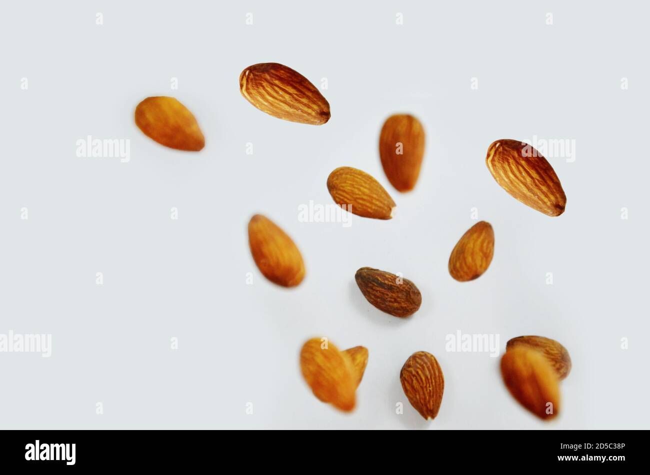 almonds fly on a white background. Composition of nuts flat lay almonds ...