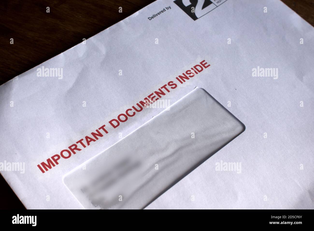 A second class A4 envelope marked with red words - Important Documents ...