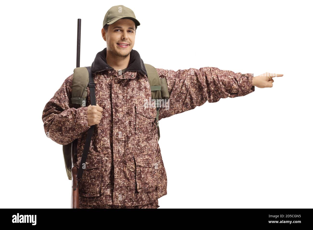 Hunter with a shotgun pointing to the side isolated on white background ...