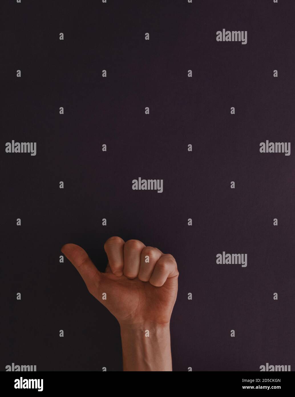 Vertical shot of a hand showing "left Stock Photo - Alamy