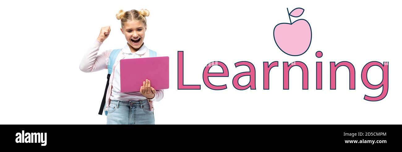 Horizontal crop of excited kid showing yeah while holding laptop near ...