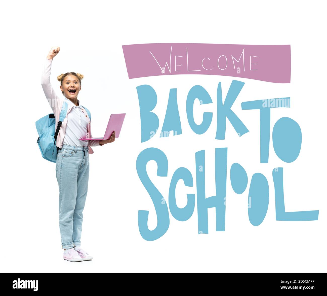Schoolgirl with laptop and backpack showing yeah gesture near welcome ...