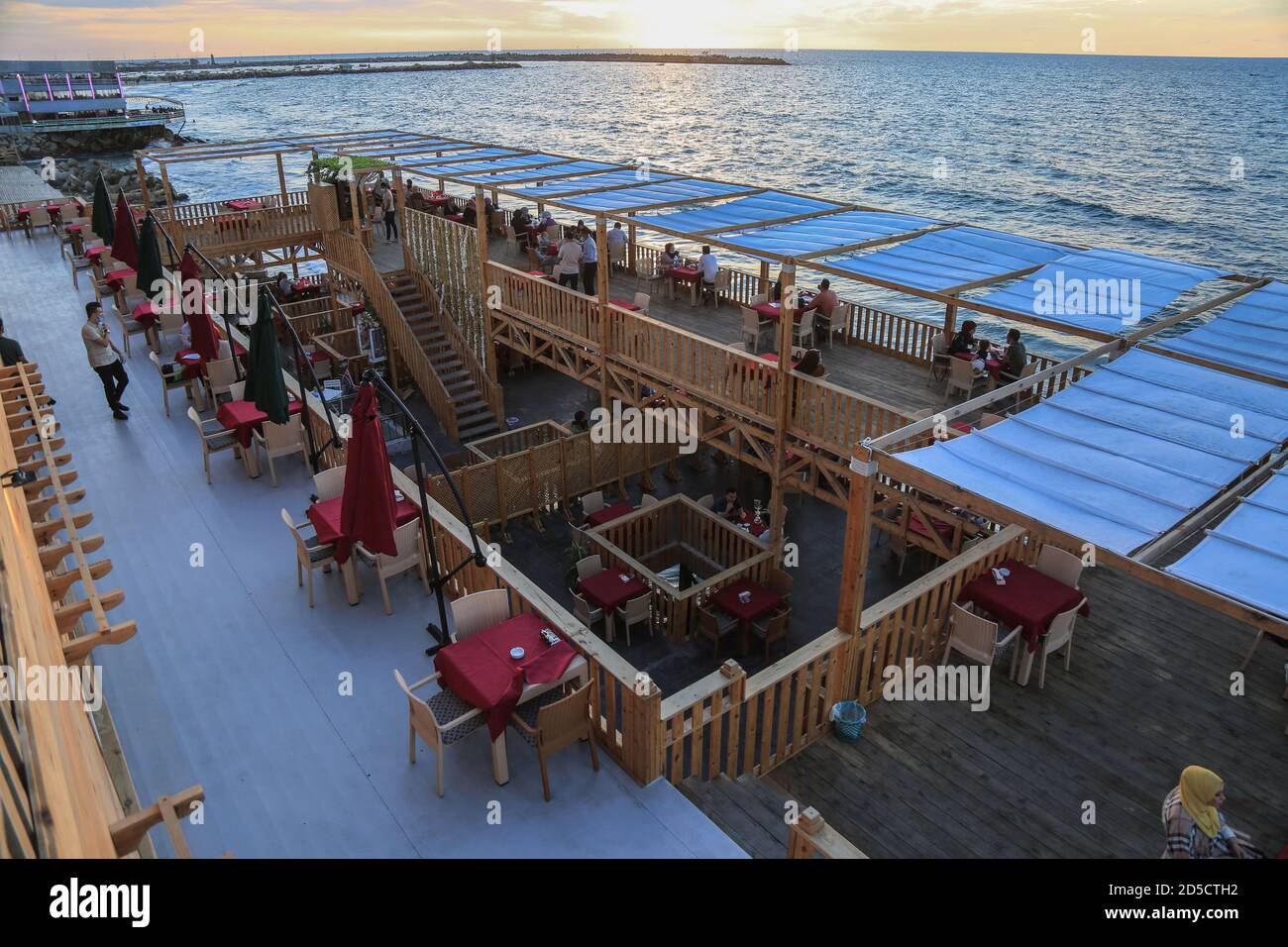 Gaza City, Palestine. 12th Oct, 2020. Palestinians enjoy their time at ...