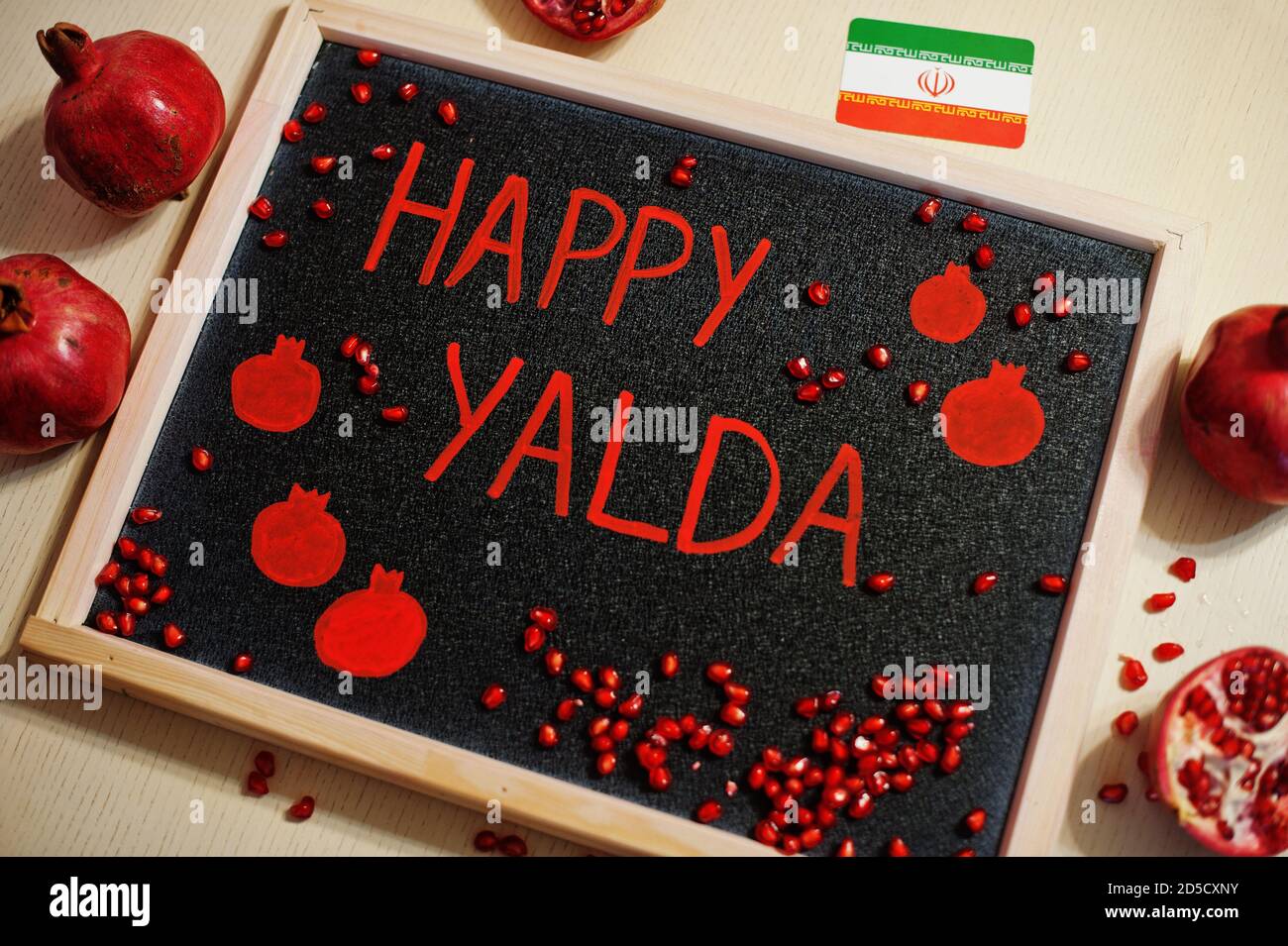 Happy Yalda night. Iranian traditional holiday. Pomegranate inscription ...