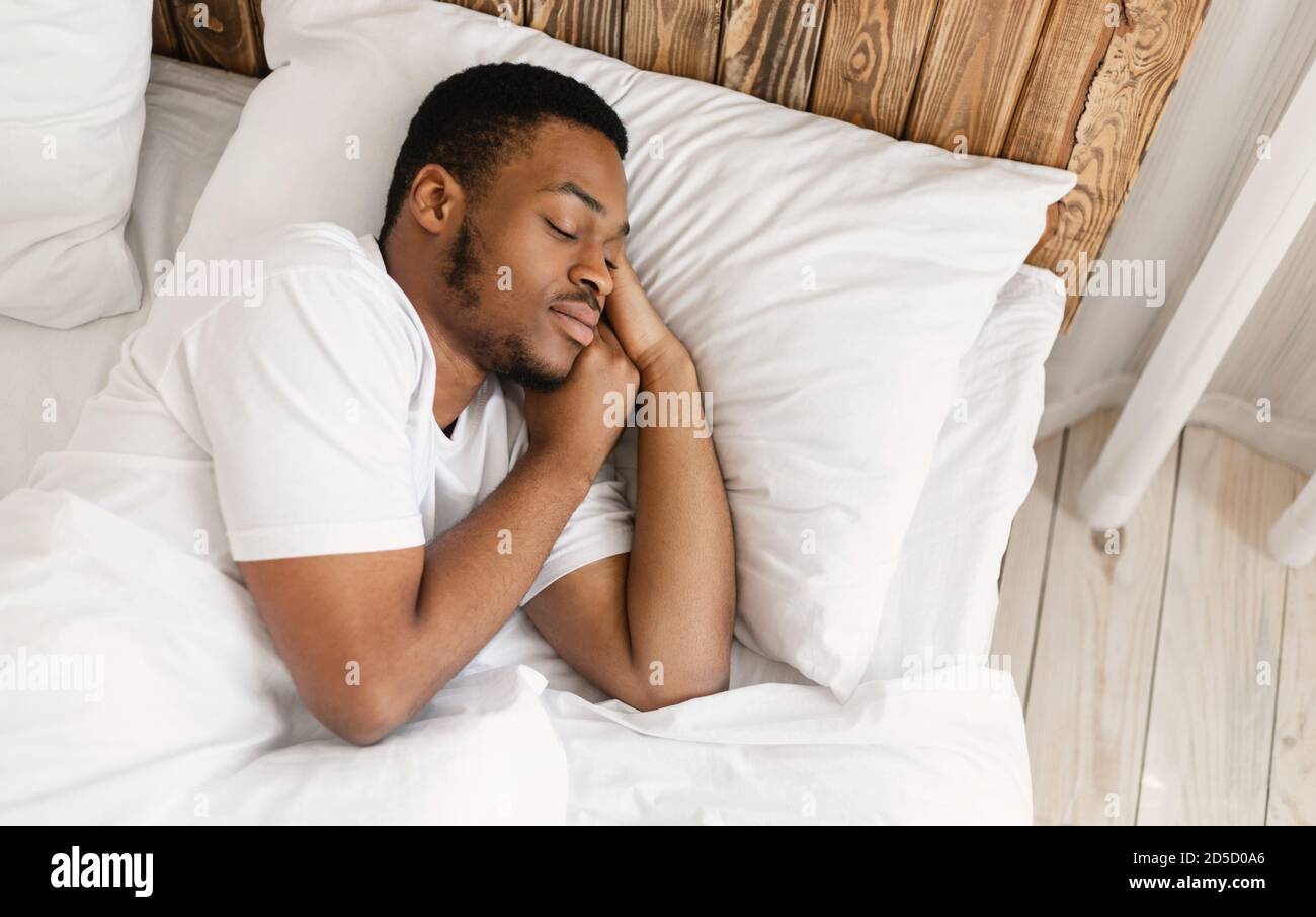 Man sleeping bed hi-res stock photography and images - Alamy