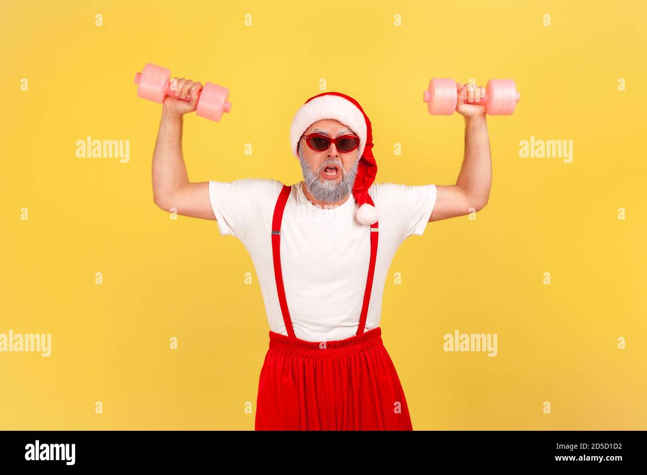 Assertive Funny Man In Santa Claus Costume Rising Hands Holding