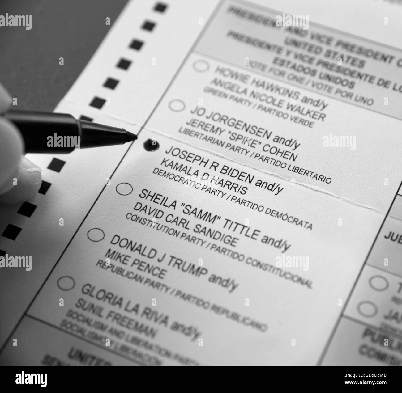 An early voter marks her ballot to vote for former Vice President Joe ...