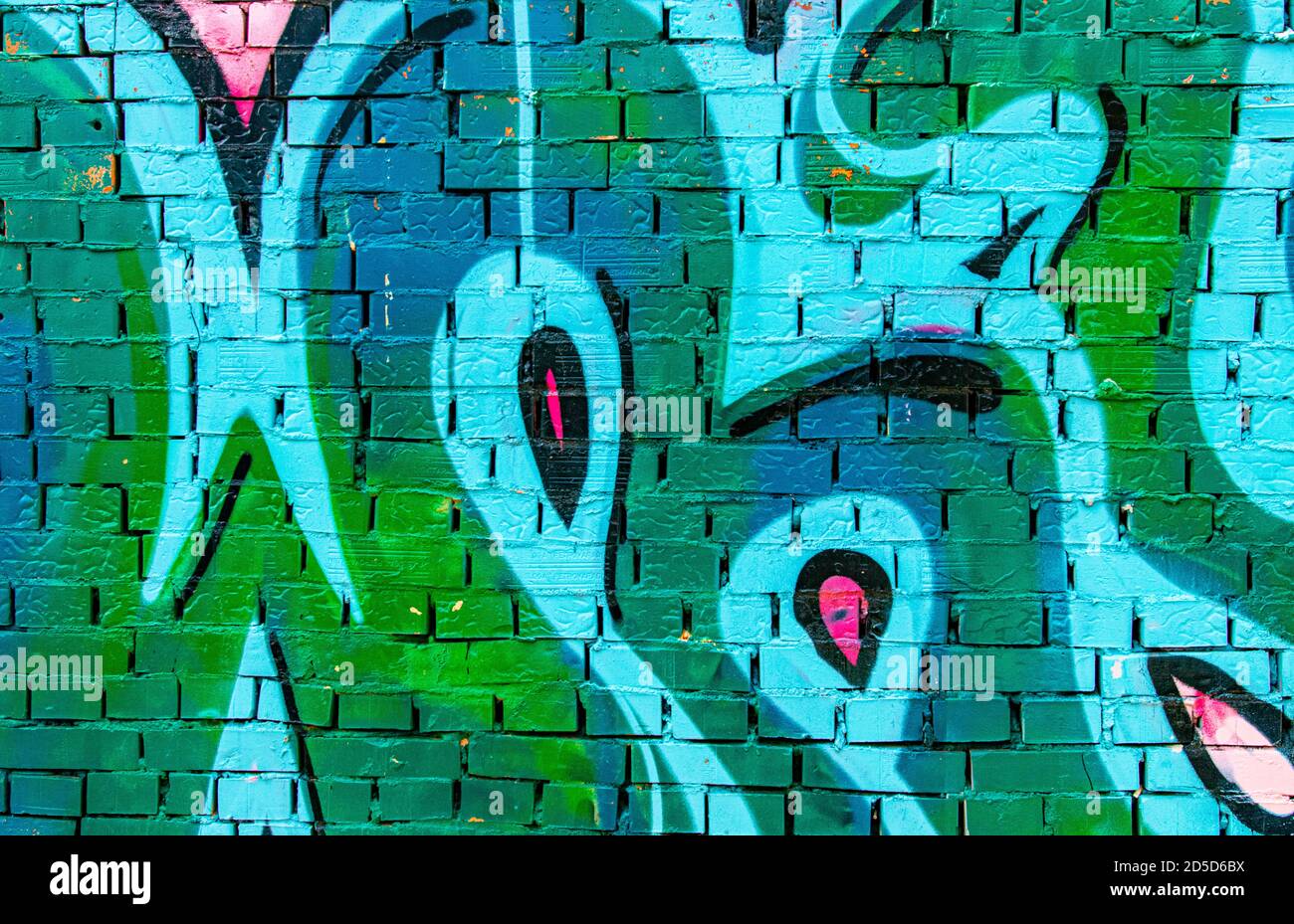 Colorful graffiti wall on street Stock Photo - Alamy