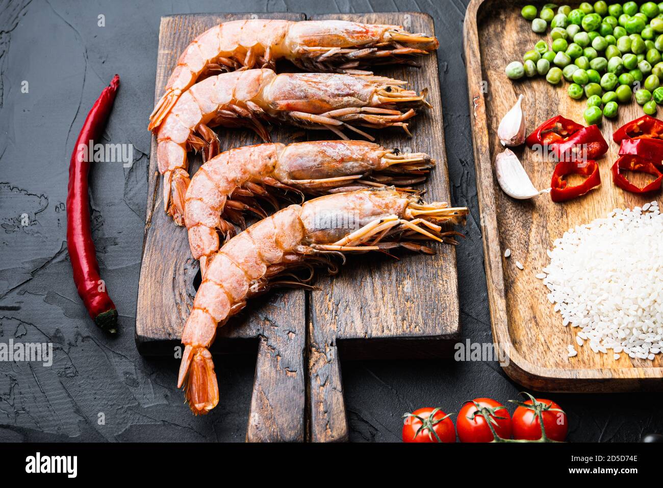 Traditional valenciana paella seafood ingredients with prawns, mussels ...