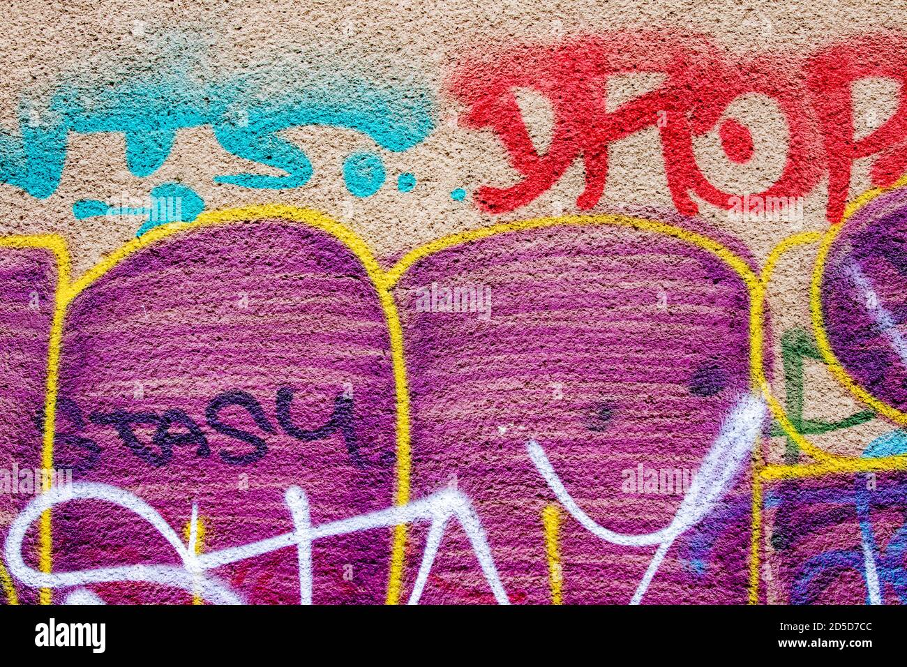 Colorful graffiti wall on street Stock Photo - Alamy