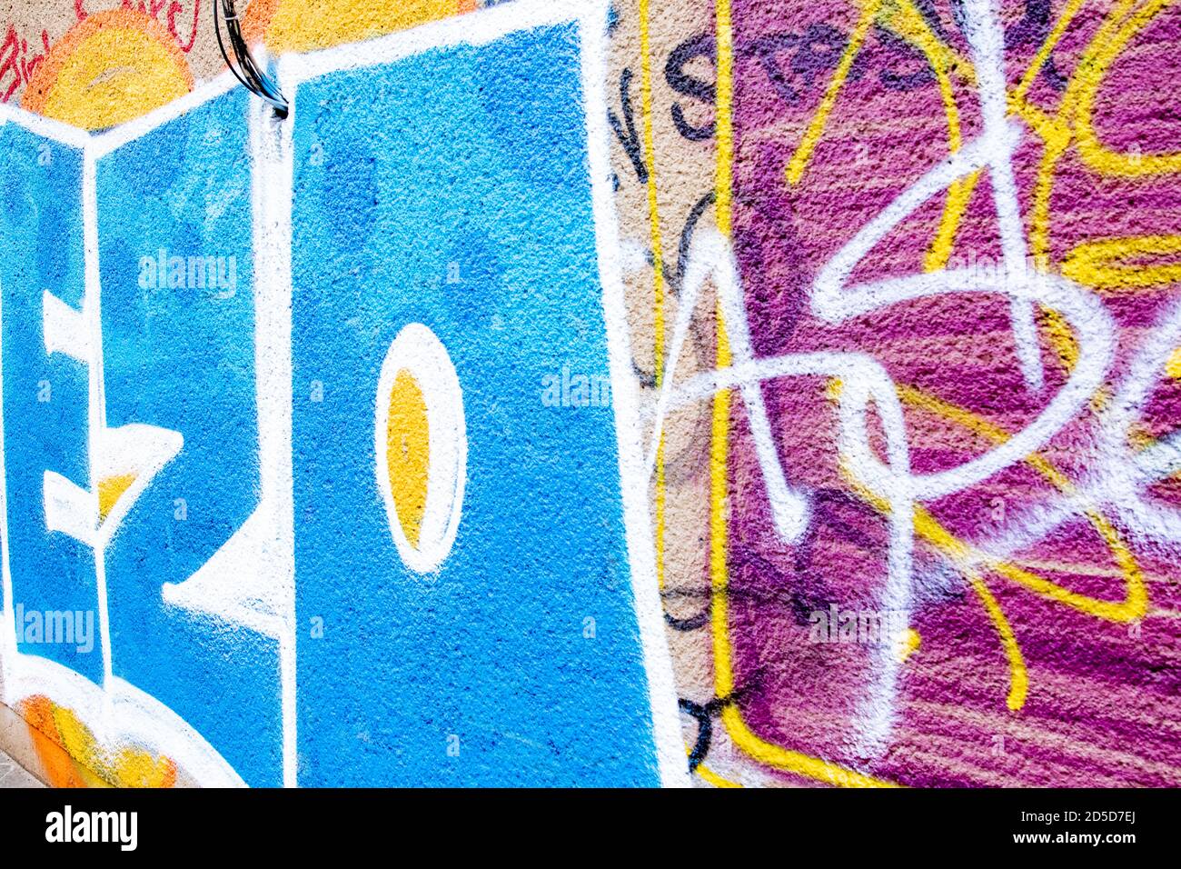 Colorful graffiti wall on street Stock Photo - Alamy